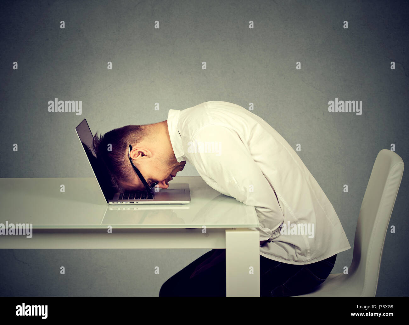 Young man resting head hi-res stock photography and images - Alamy