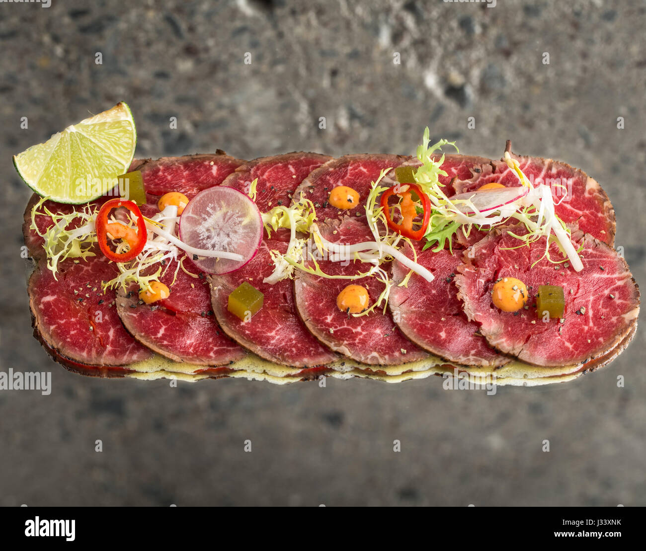 Beef new style sashimi Stock Photo - Alamy