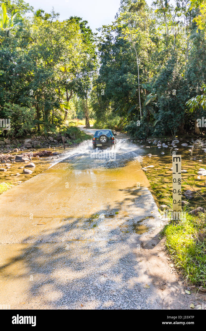 Car driving through a ford in Queensland, Australia Stock Photo - Alamy