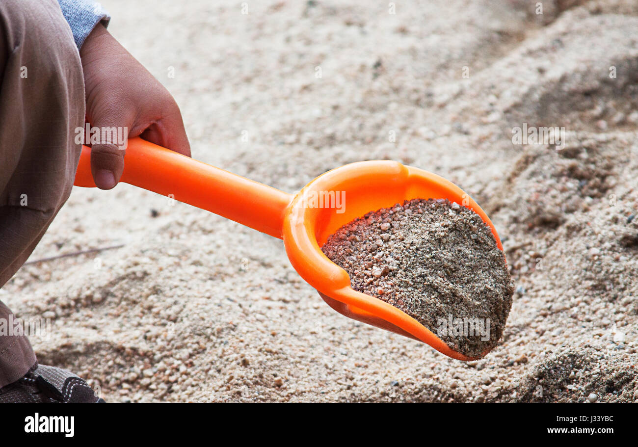 Children playing in sand pit hi-res stock photography and images - Alamy