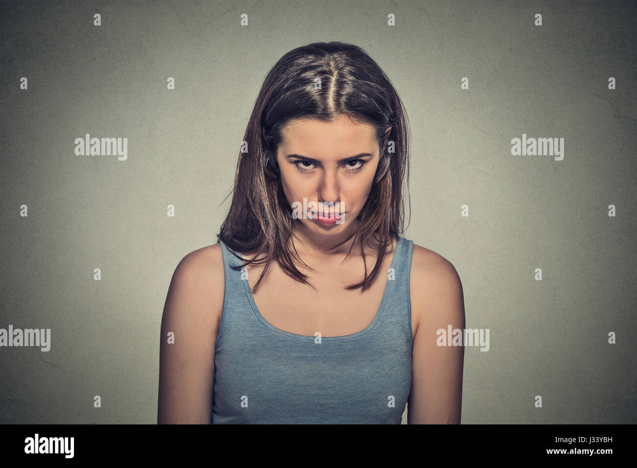 Closeup portrait angry young woman about to have nervous atomic ...