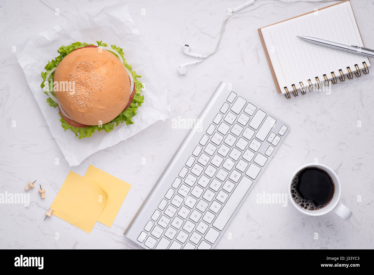 Lunch in office, delicious homemade burger on table Stock Photo - Alamy
