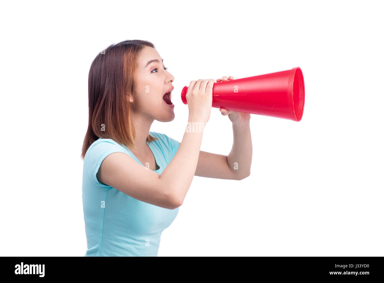 Asian girl shouting with a megaphone Stock Photo - Alamy
