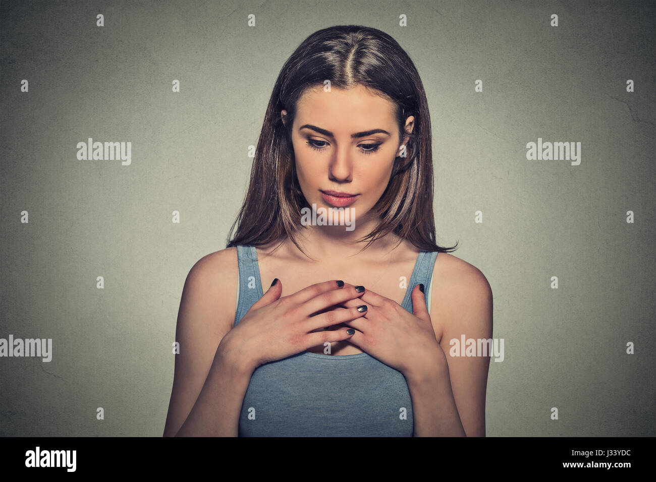 Embarrassed shy nervous young woman hi-res stock photography and images ...