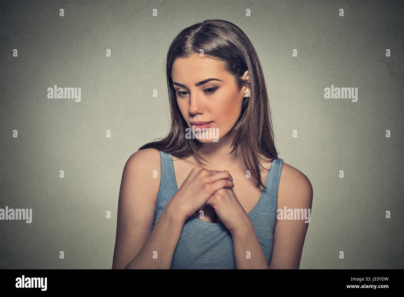 Embarrassed shy nervous young woman hi-res stock photography and images ...