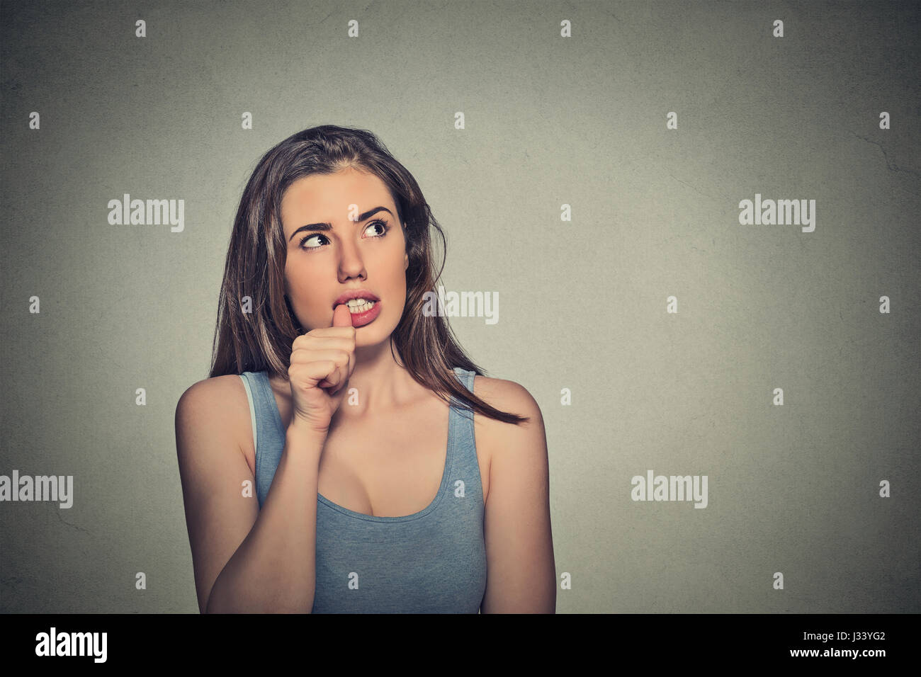 Embarrassed shy nervous young woman hi-res stock photography and images ...