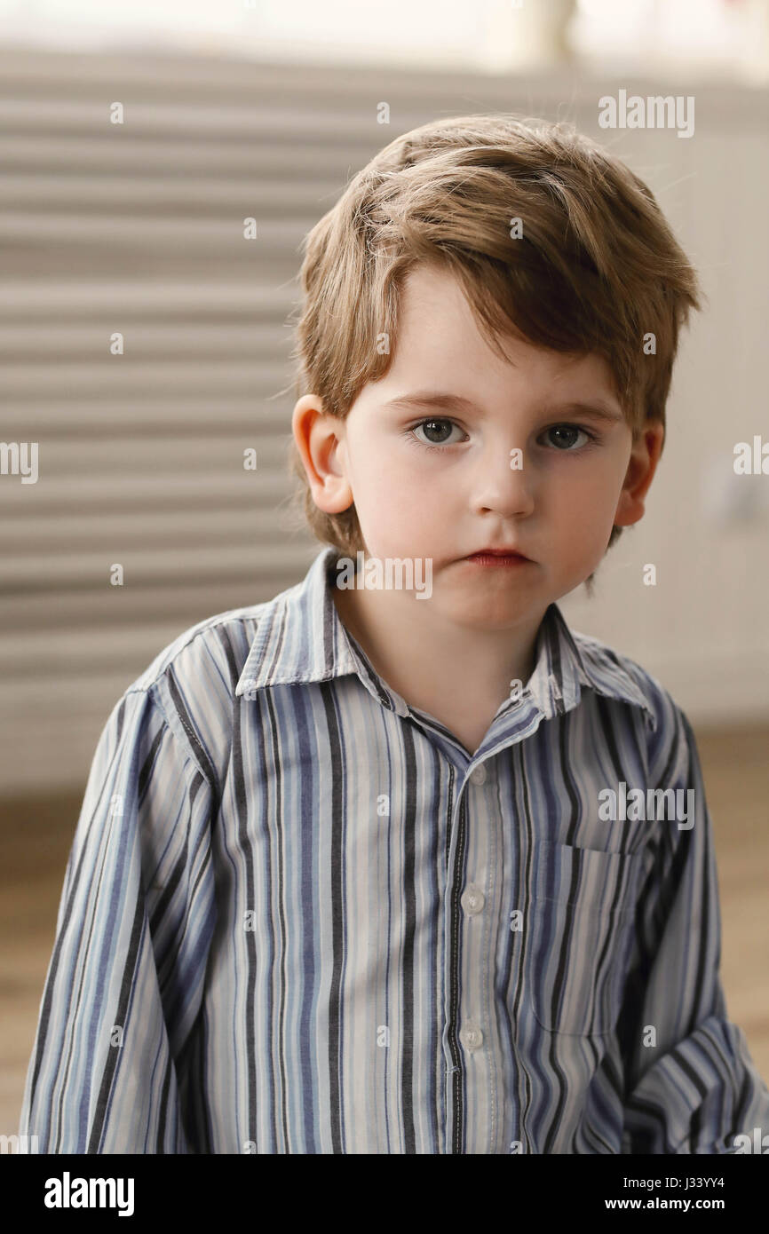 Childhood. Young boy at home Stock Photo - Alamy