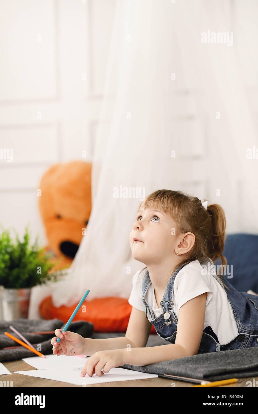 Childhood. Young girl at home Stock Photo - Alamy