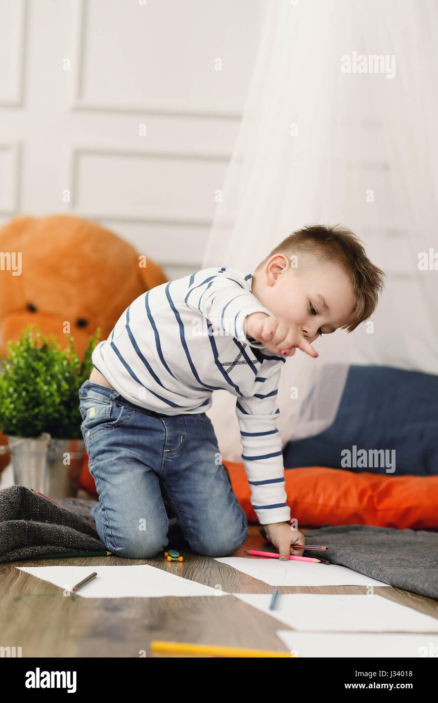 Childhood. Young boy at home Stock Photo - Alamy