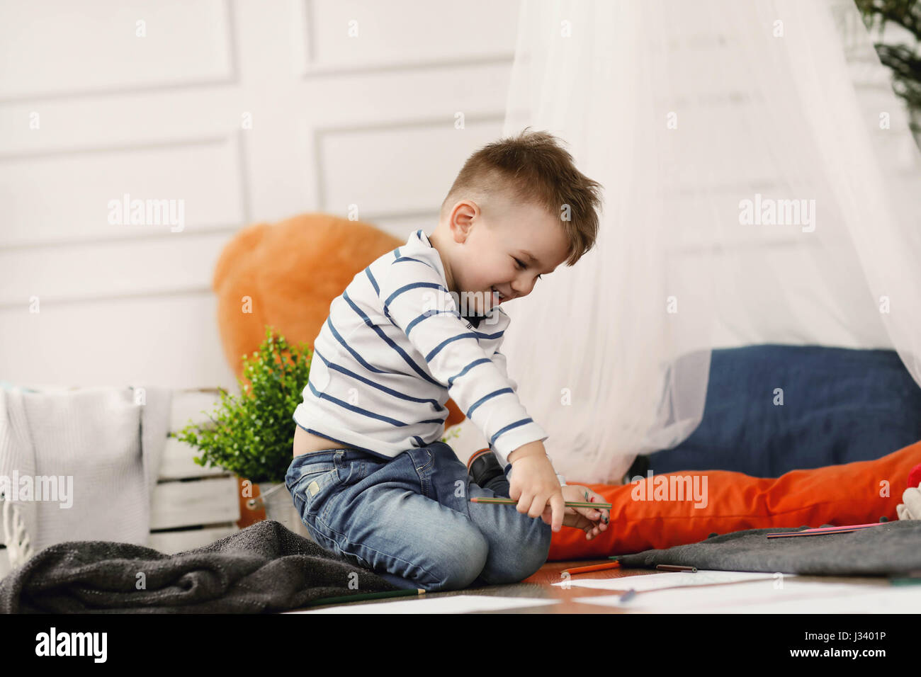 Childhood. Young boy at home Stock Photo - Alamy