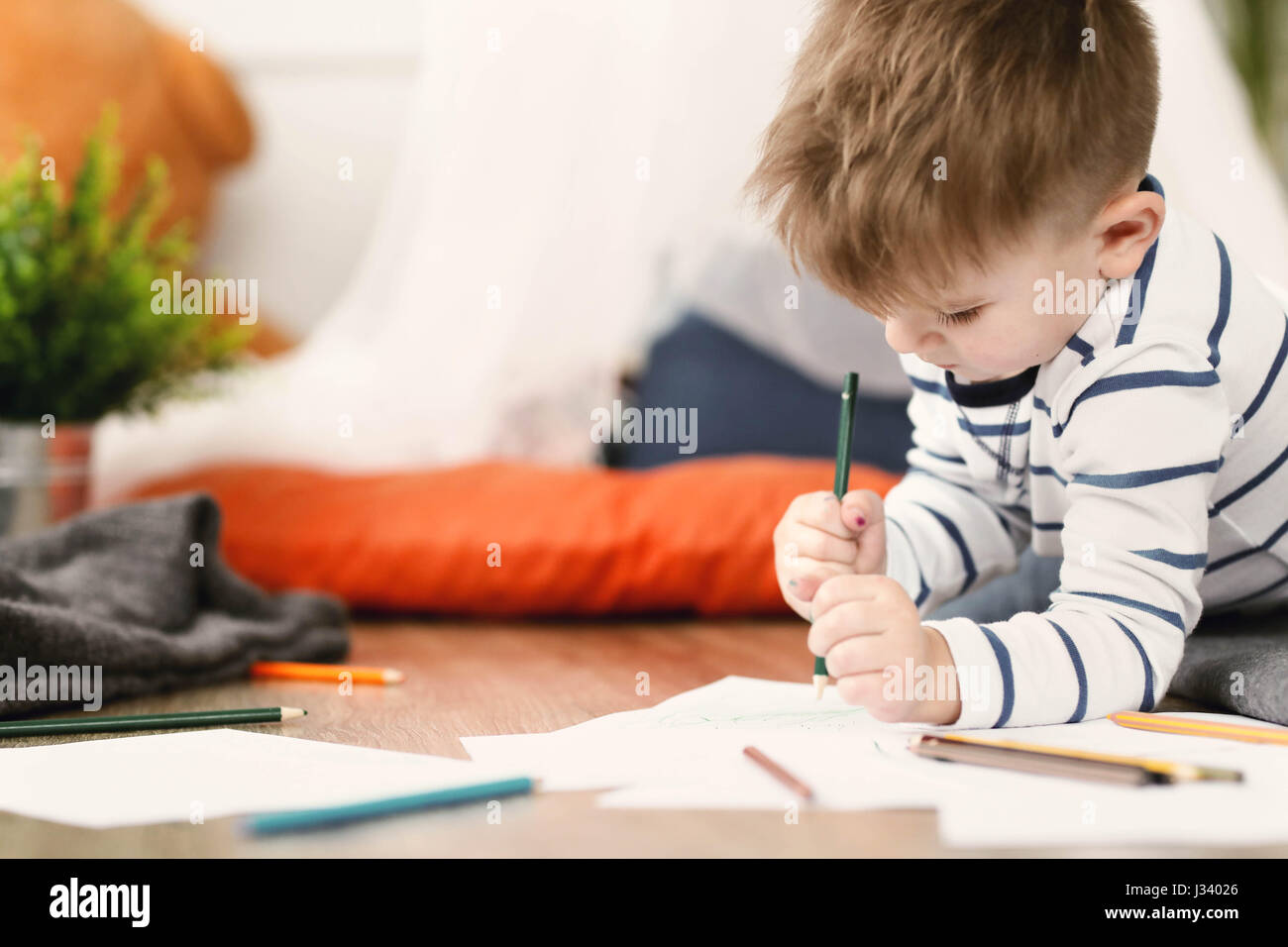 Childhood. Young boy at home Stock Photo - Alamy