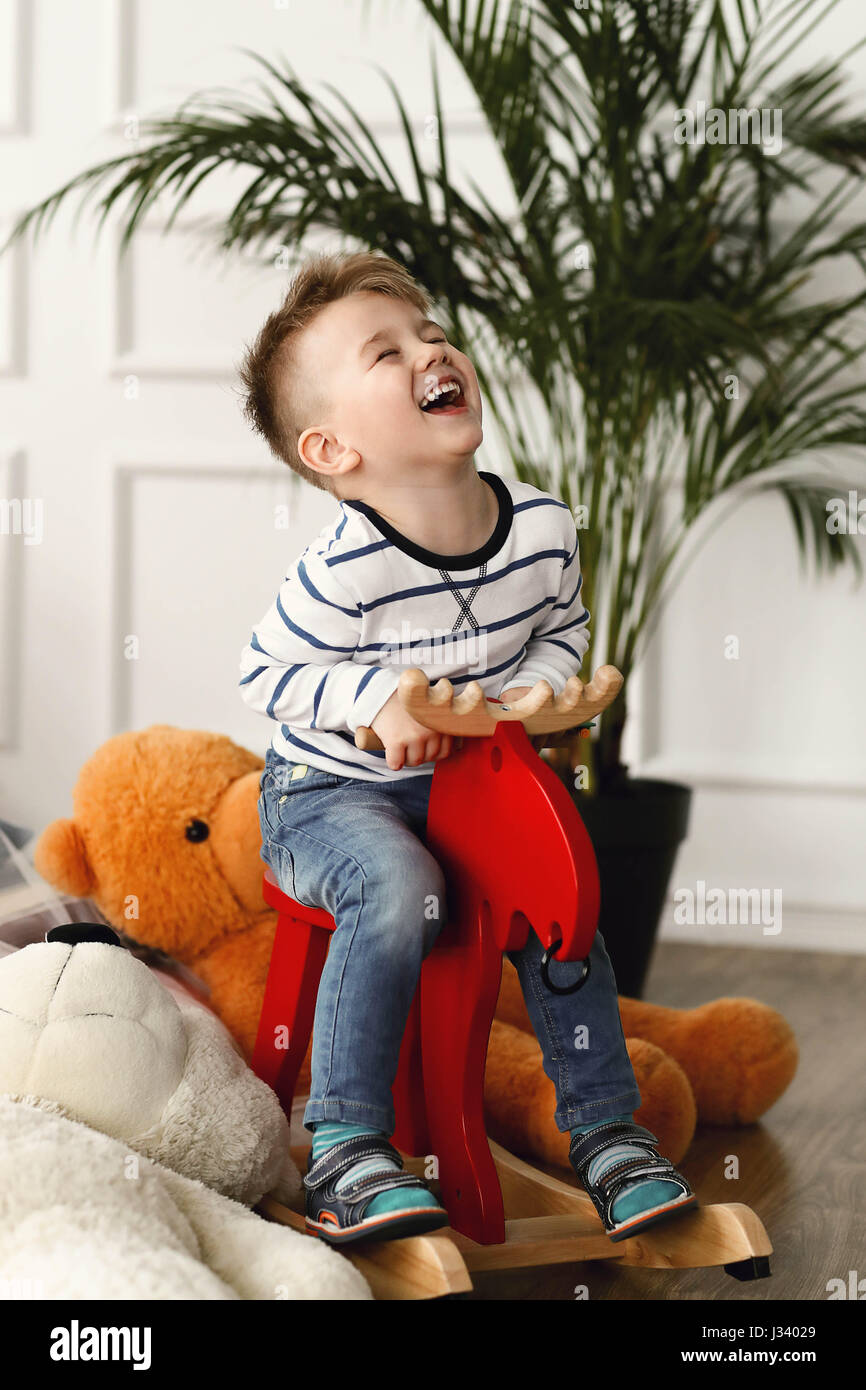 Childhood. Young boy at home Stock Photo - Alamy