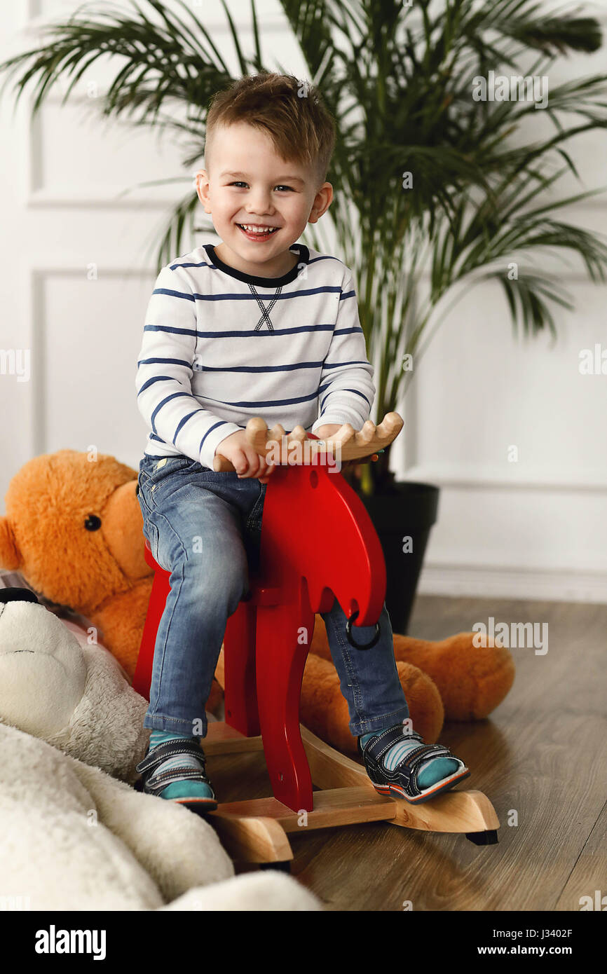 Childhood. Young boy at home Stock Photo - Alamy