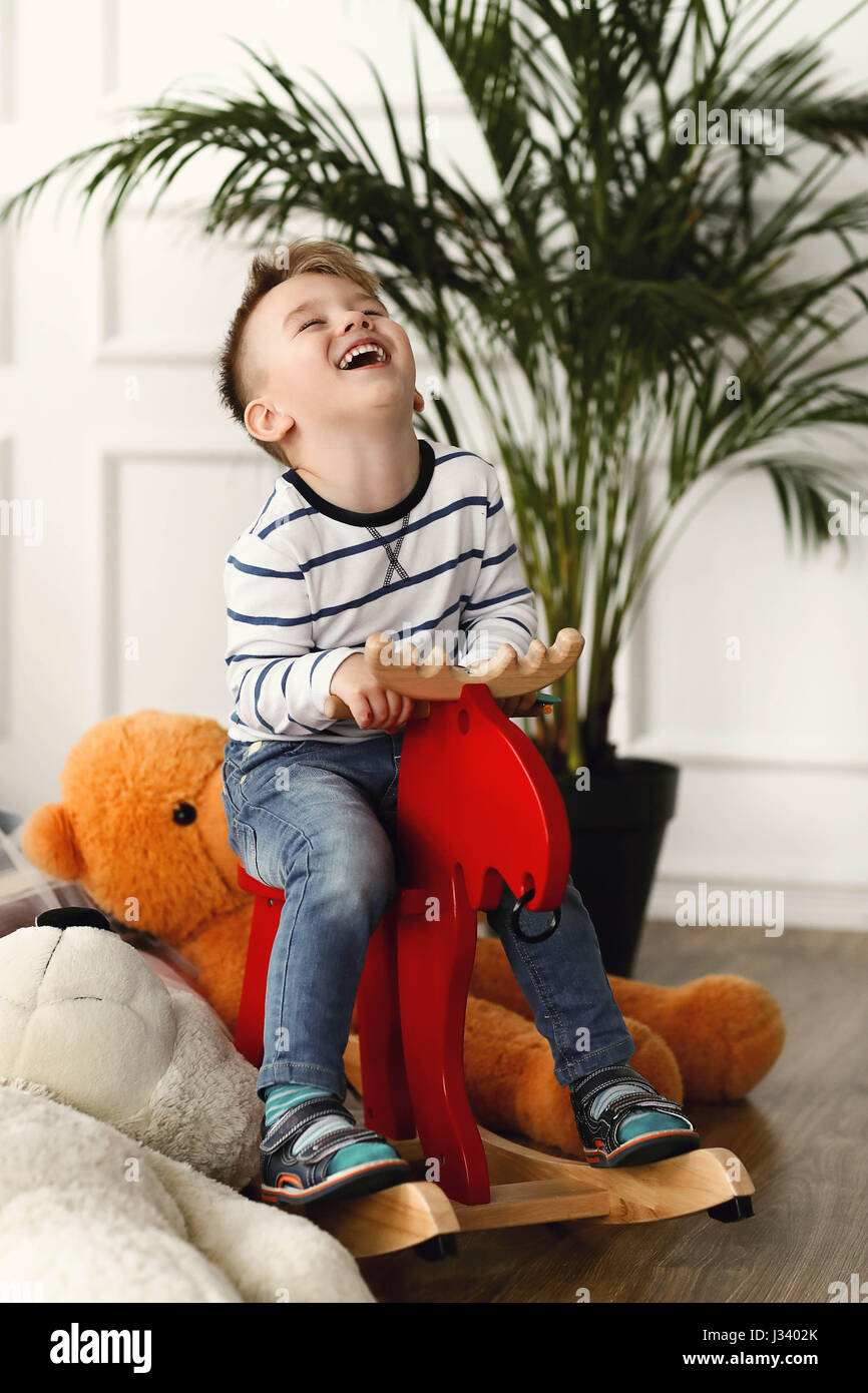 Childhood. Young boy at home Stock Photo - Alamy