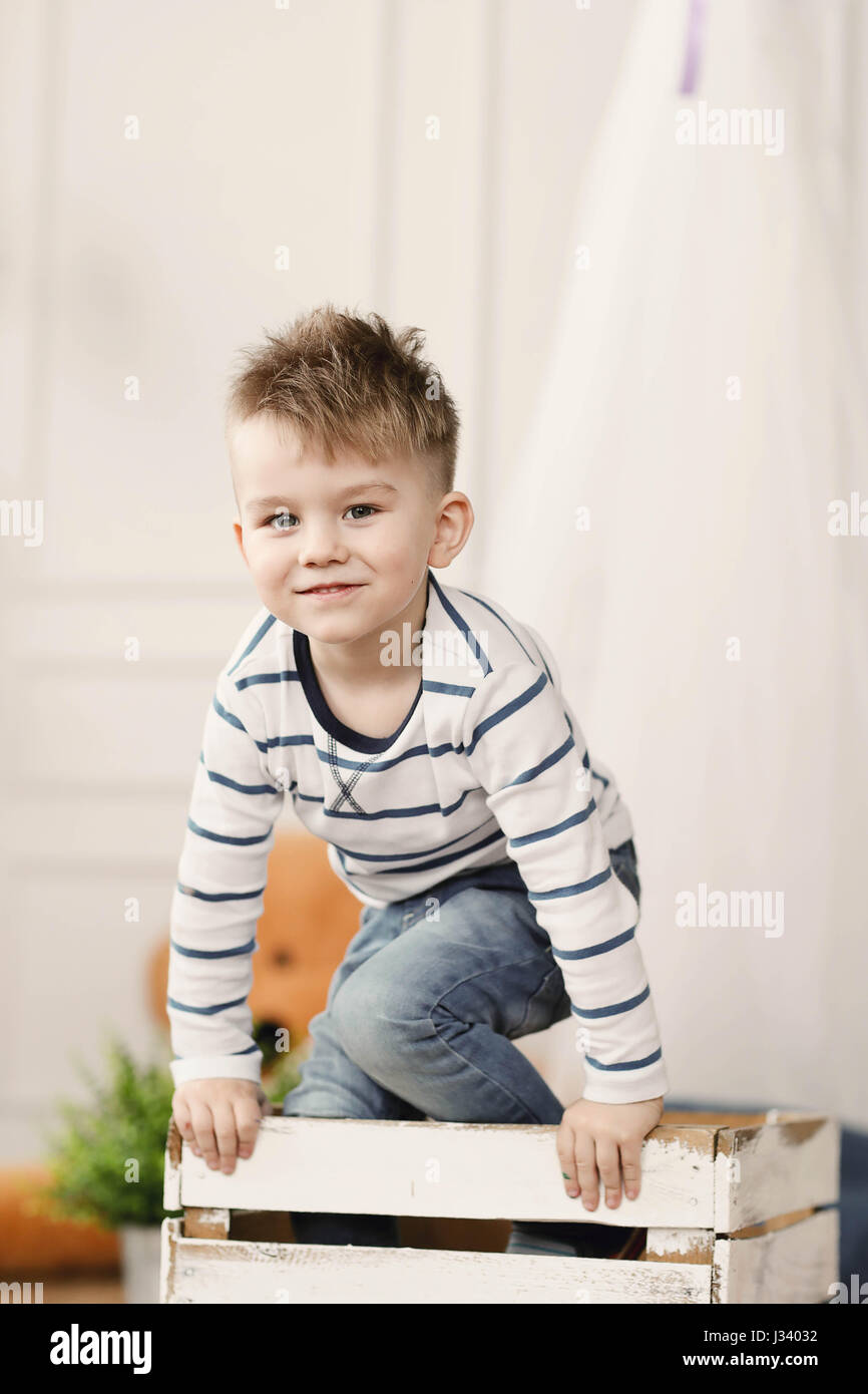 Childhood. Young boy at home Stock Photo - Alamy
