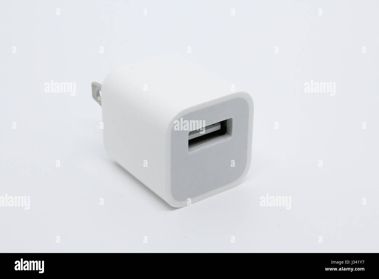 Electric power adapter isolated on white background Stock Photo - Alamy