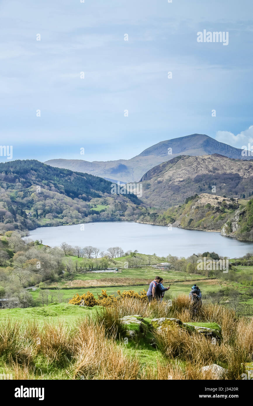 A family setting up for a photograph with Snowdonia in the background ...