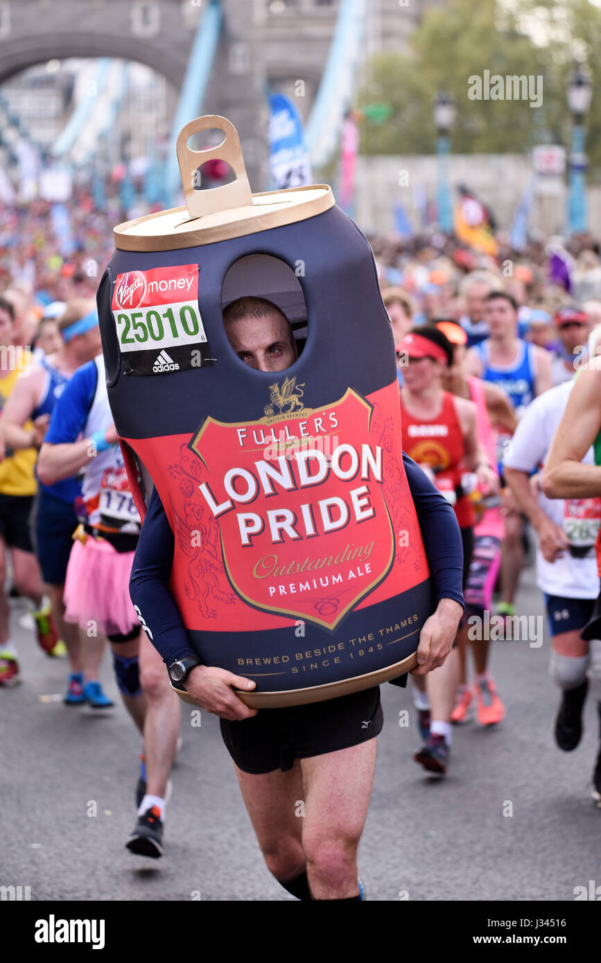 Mark Herbert running in the 2017 London Marathon near Tower Bridge as a ...