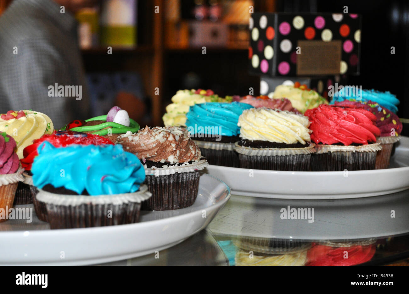 Bright colorful multicolored cupcakes in British museum cafe in London ...