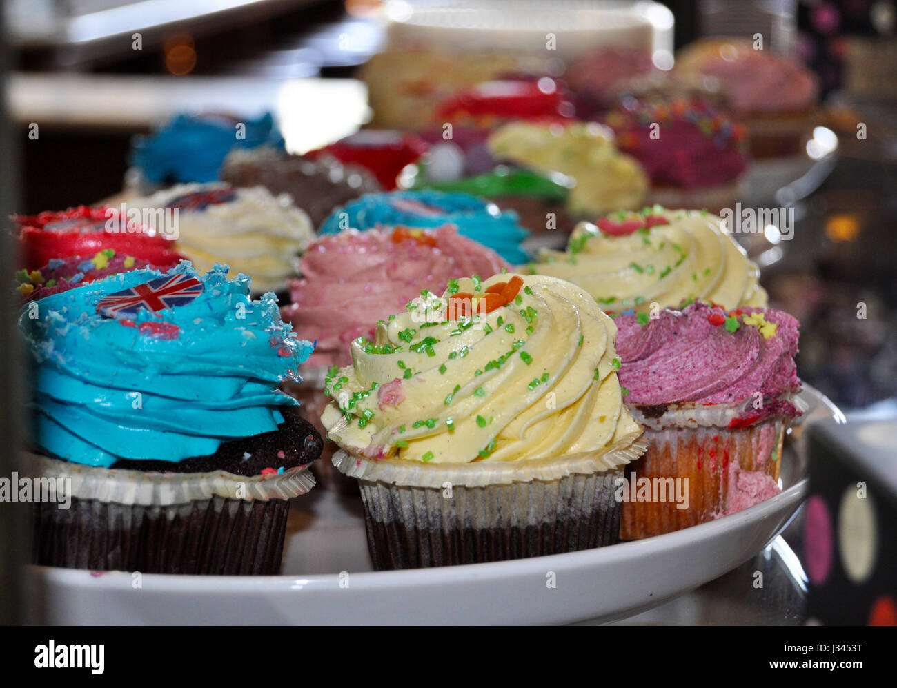 Bright colorful multicolored cupcakes in British museum cafe in London ...