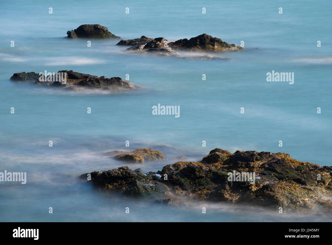 Ocean Waves Over Rocks at Cliff Walk in Rhode Island Stock Photo - Alamy