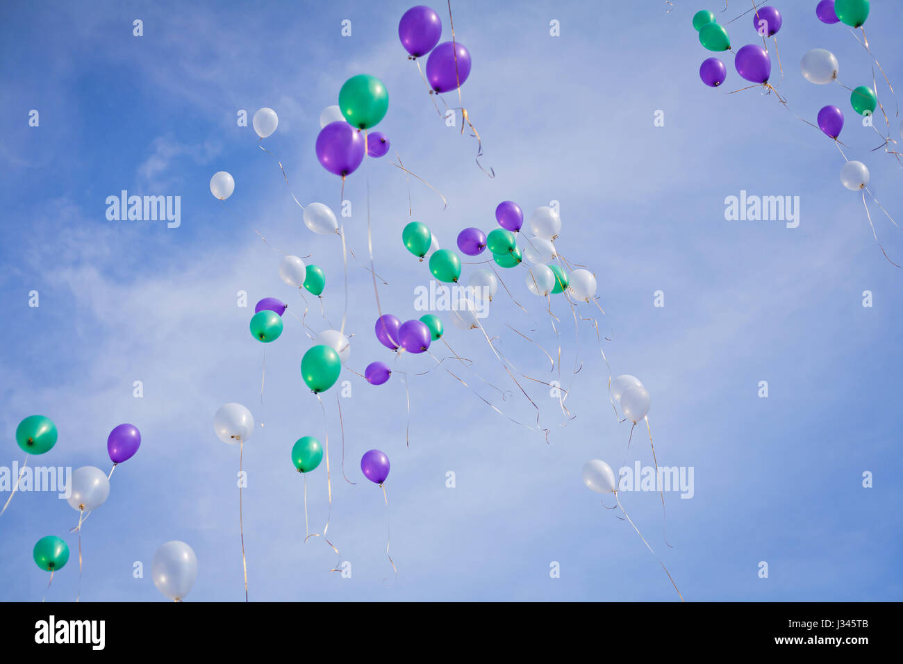 Multscolored balloons flying in sky at the wedding (useful as texture ...