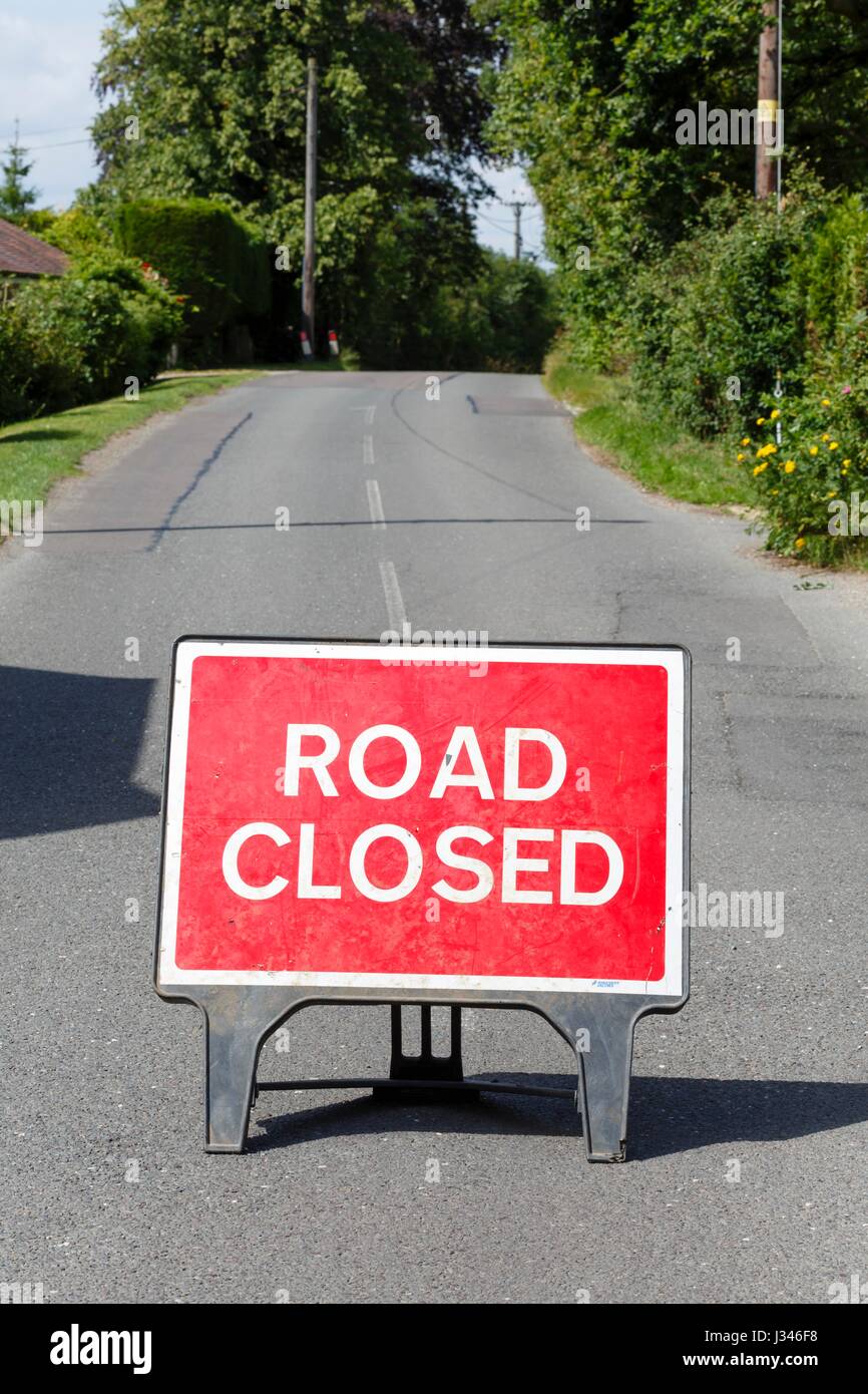 Road sign on a street showing a road closure Stock Photo - Alamy