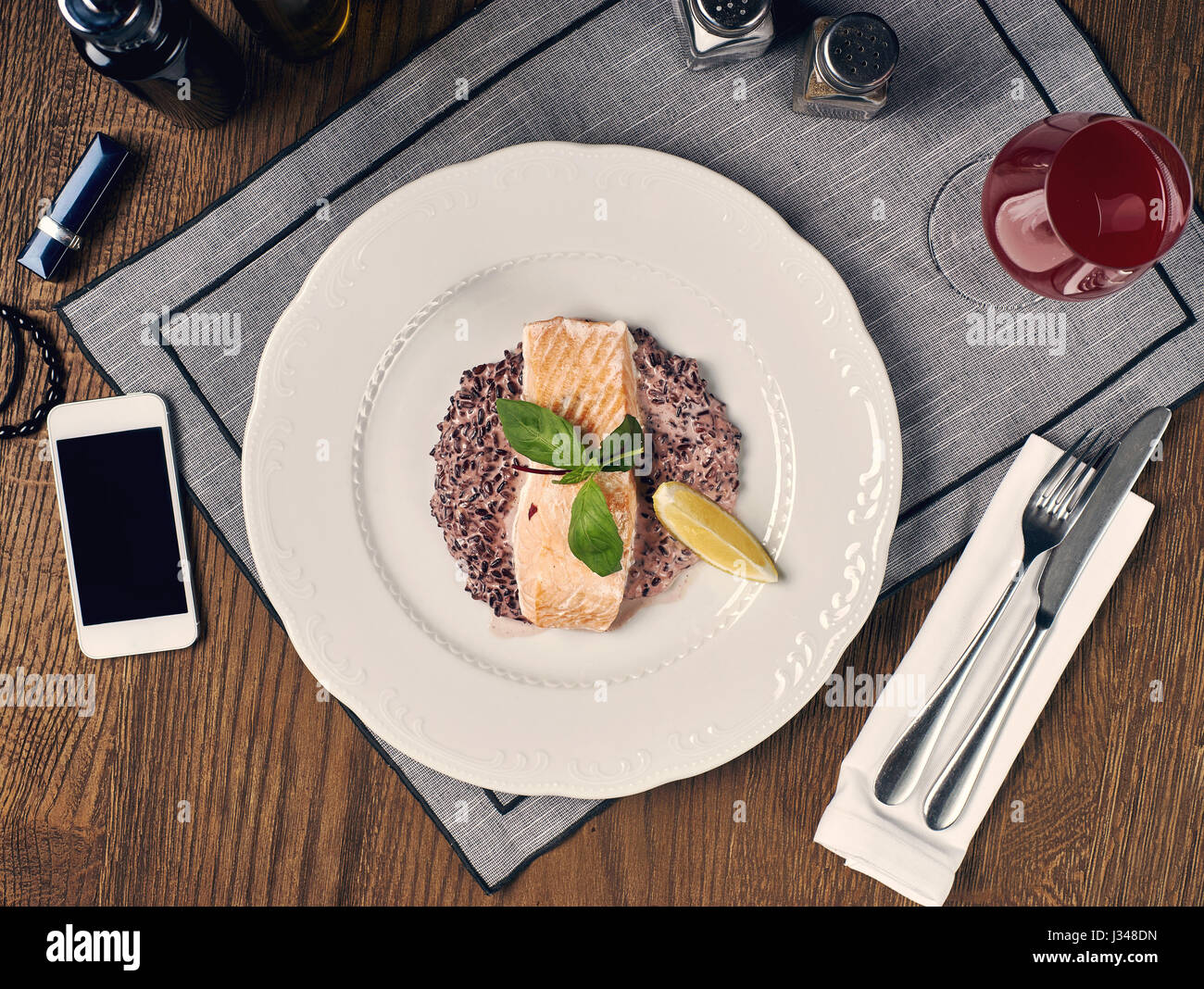 Salmon with purple risotto Stock Photo - Alamy