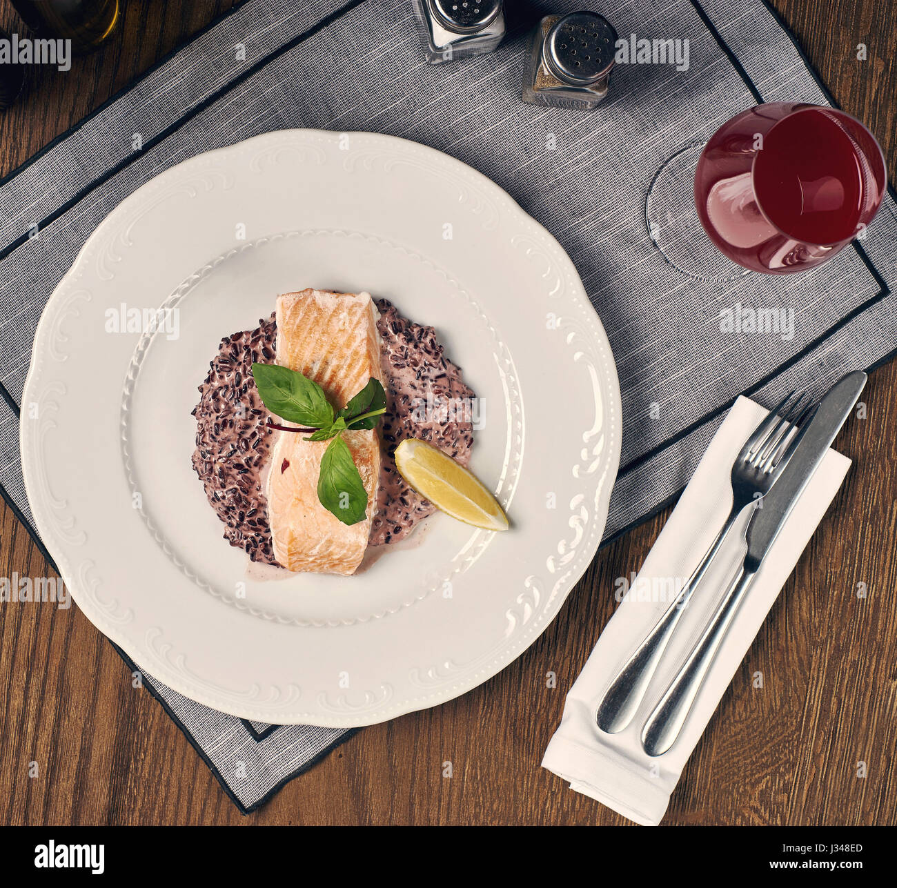 Salmon with purple risotto Stock Photo - Alamy