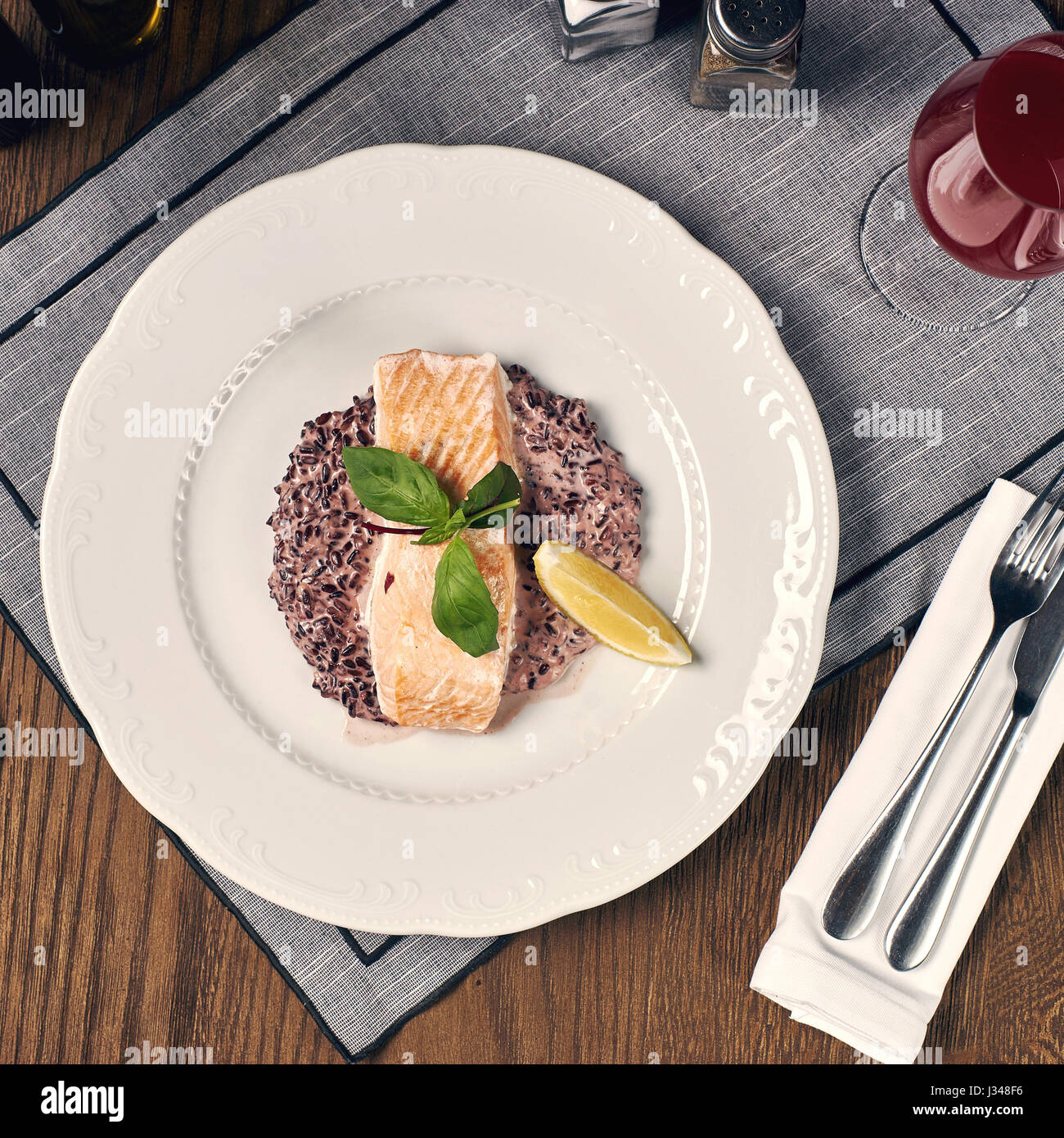 Salmon with purple risotto Stock Photo - Alamy