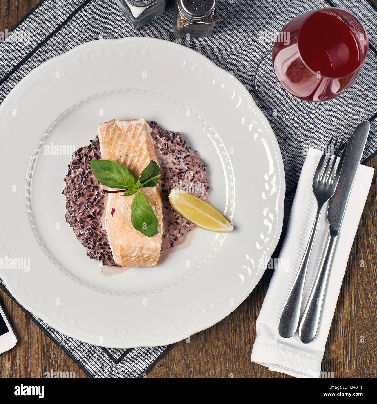 Salmon with purple risotto Stock Photo - Alamy