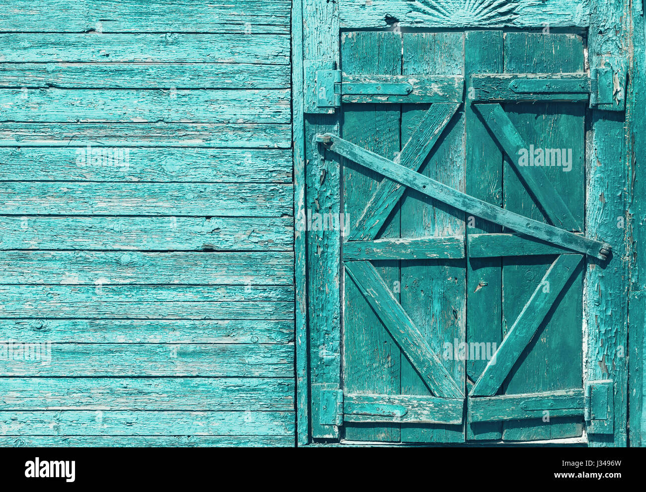 Old closed blue shutter hi-res stock photography and images - Alamy