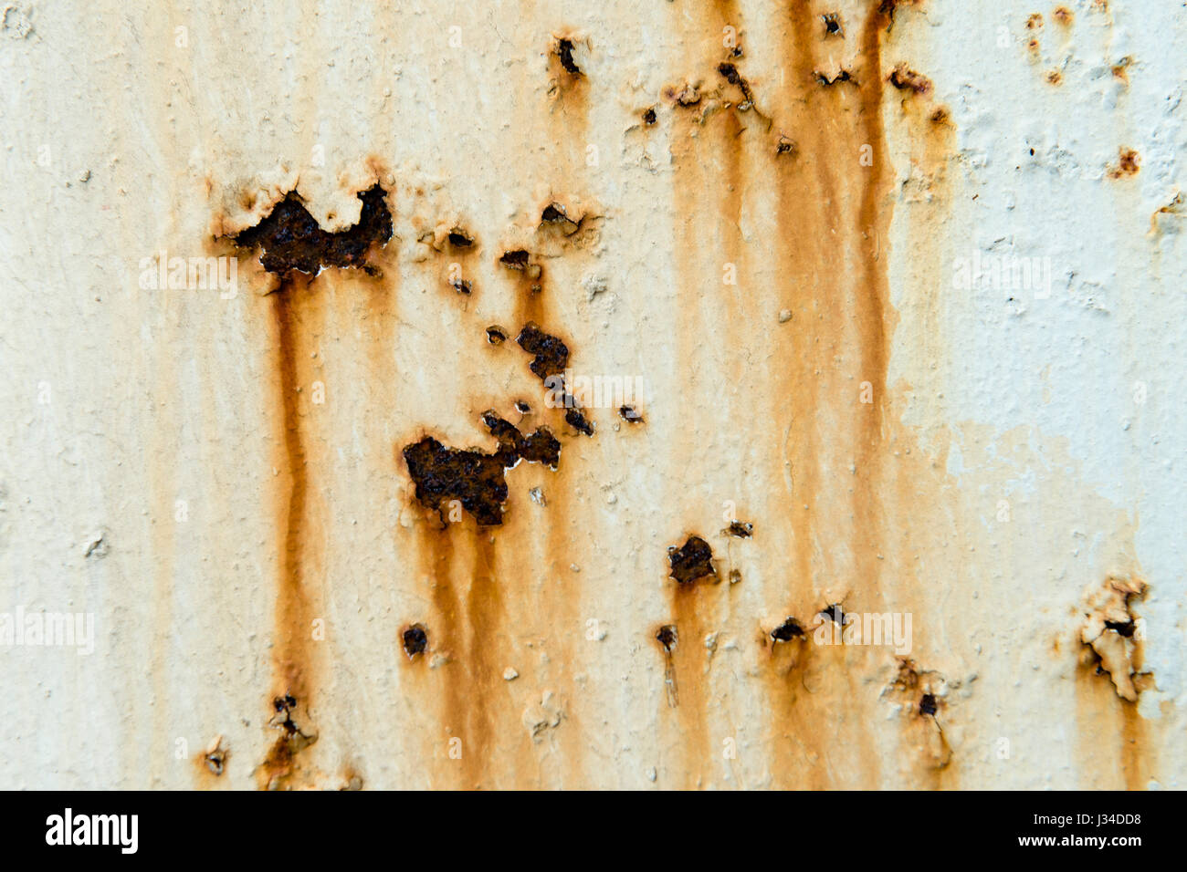 Rusted steel wall, once painted Stock Photo - Alamy