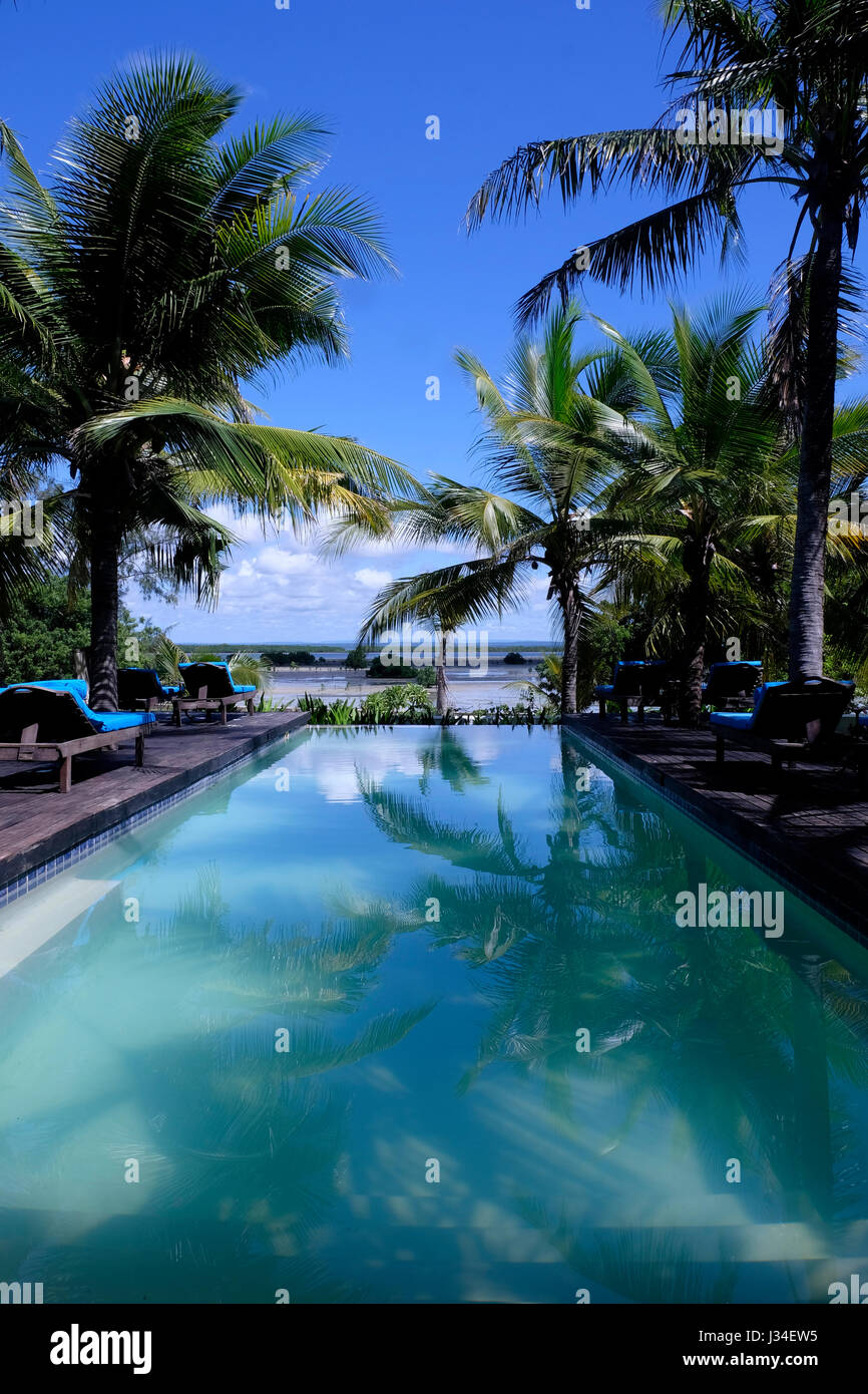 The swimming pool of Ibo Island Lodge located on the prime waterfront ...