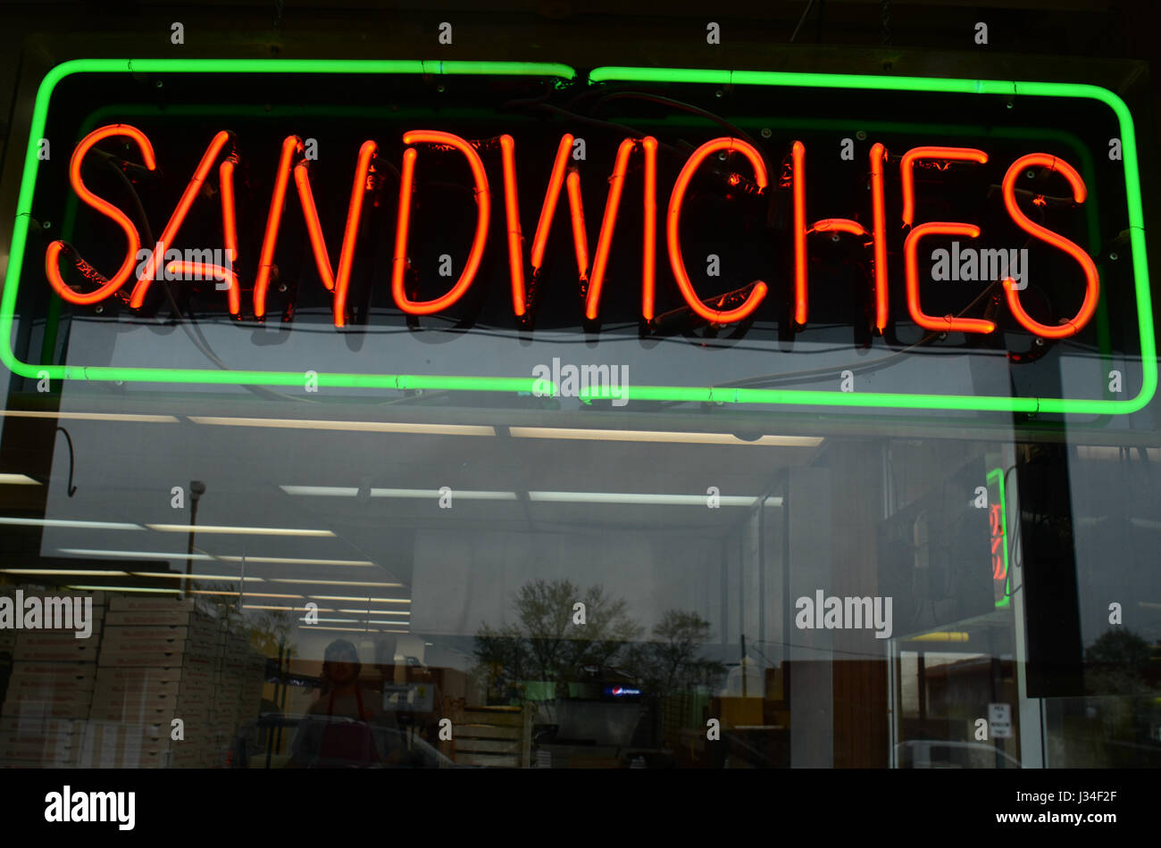 red and green illuminated neon signs Stock Photo - Alamy