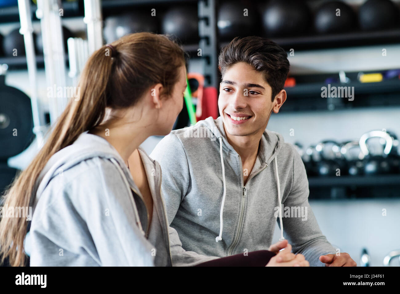 Couple talking in gym hi-res stock photography and images - Alamy