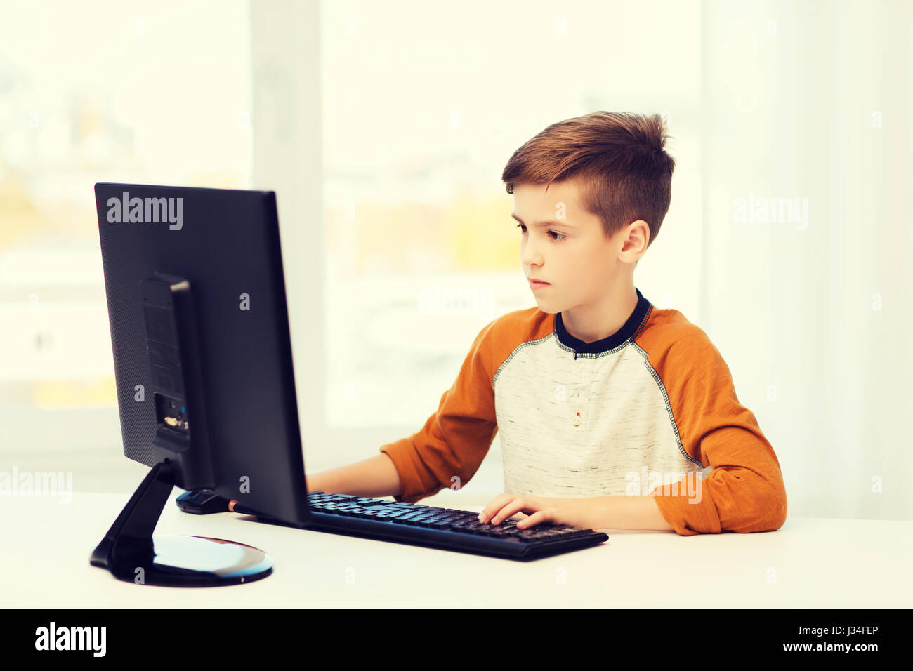 Hispanic Teen Boy Computer High Resolution Stock Photography and Images ...