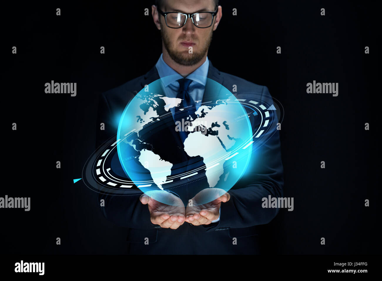 businessman with virtual earth projection Stock Photo - Alamy