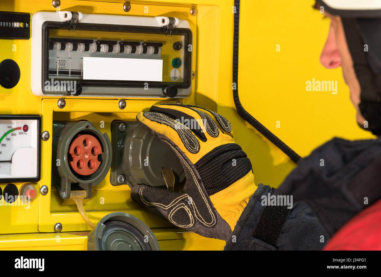 German firefighter on the fire truck and operated power generator Stock ...