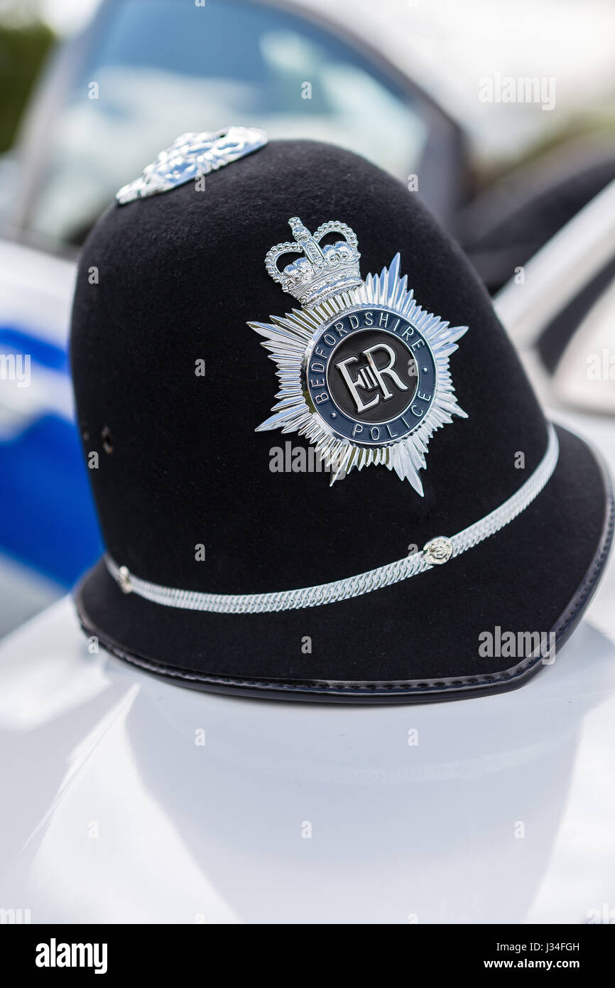 A close up of a traditional Bedfordshire Policeman's helmet sitting on ...