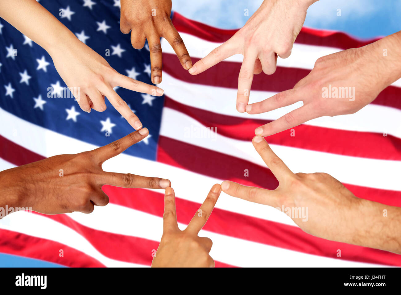 group of international people showing peace sign Stock Photo - Alamy