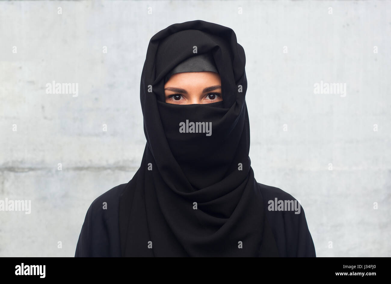 Woman in gray hijab hi-res stock photography and images - Alamy