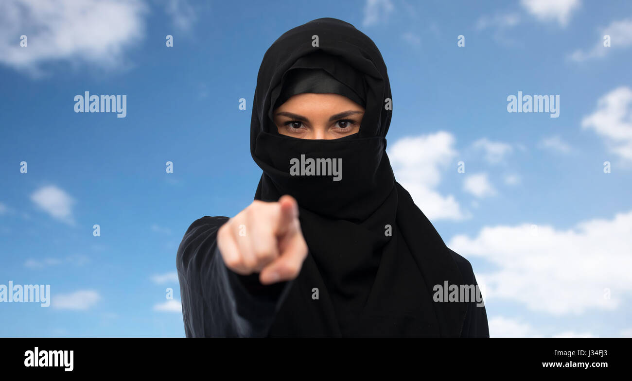 muslim woman in hijab pointing finger to you Stock Photo - Alamy