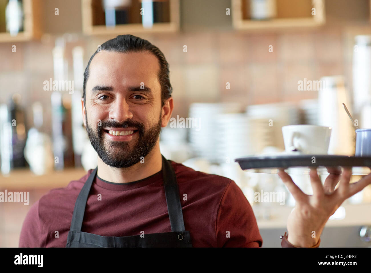 happy man or waiter with coffee and sugar at bar Stock Photo - Alamy