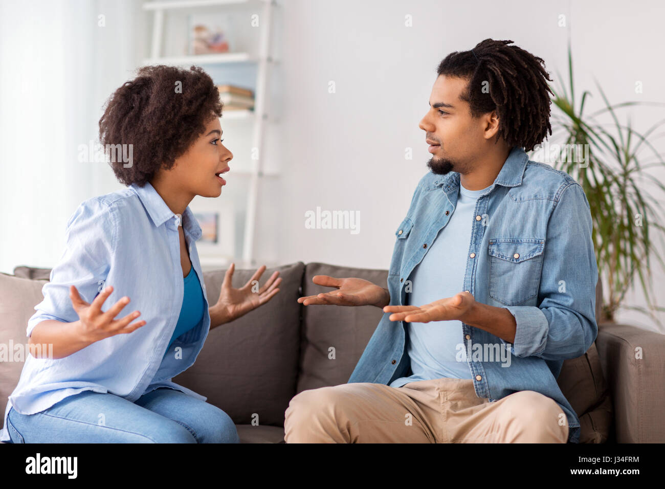 unhappy couple having argument at home Stock Photo - Alamy
