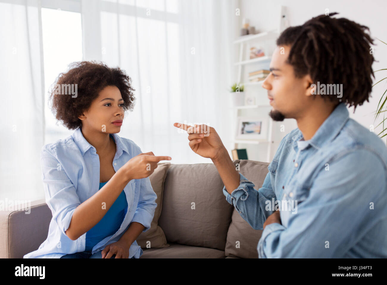 unhappy couple having argument at home Stock Photo - Alamy