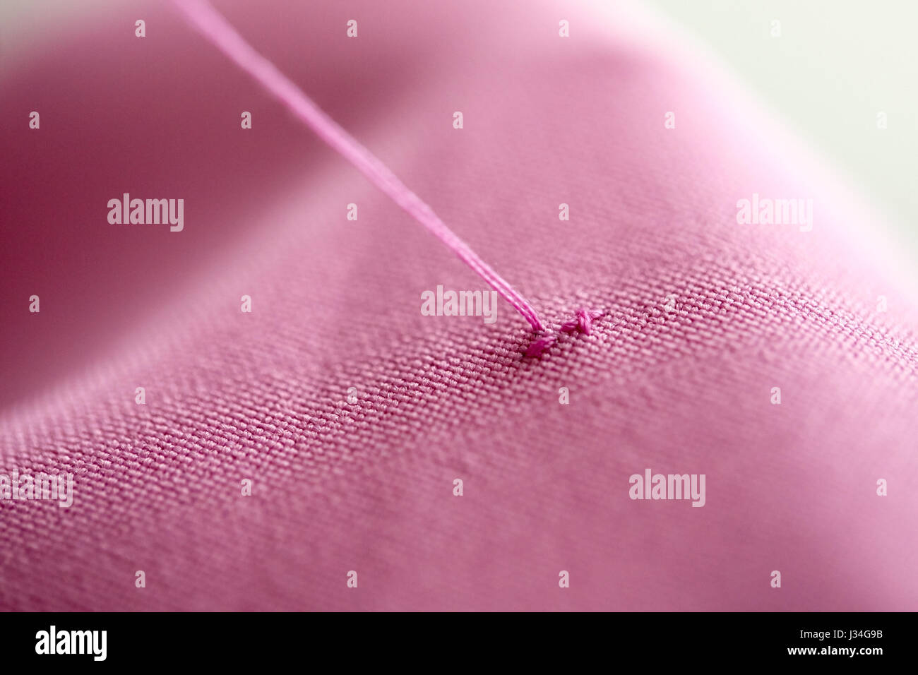 Cross stitch needle hi-res stock photography and images - Alamy