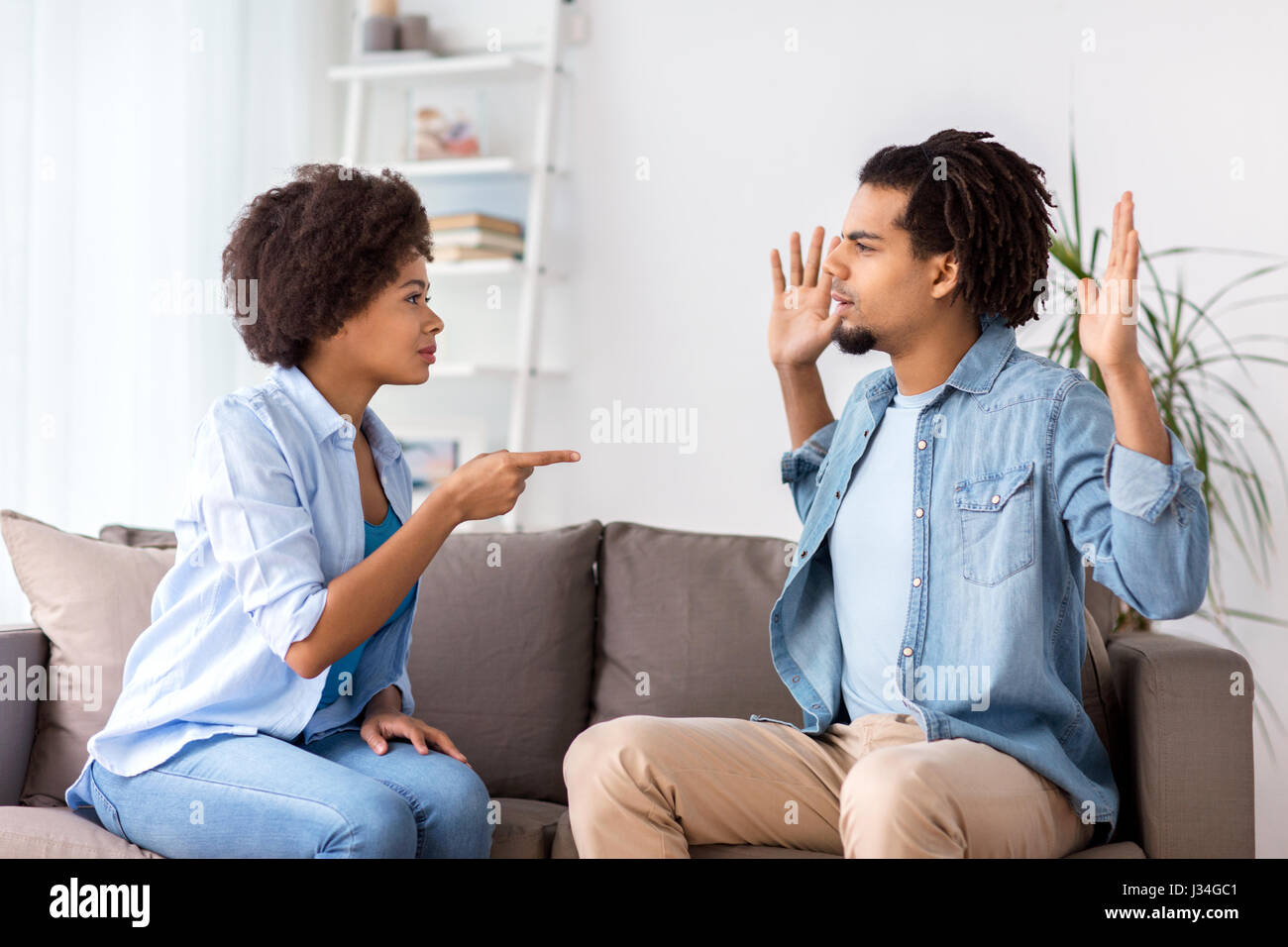 unhappy couple having argument at home Stock Photo - Alamy