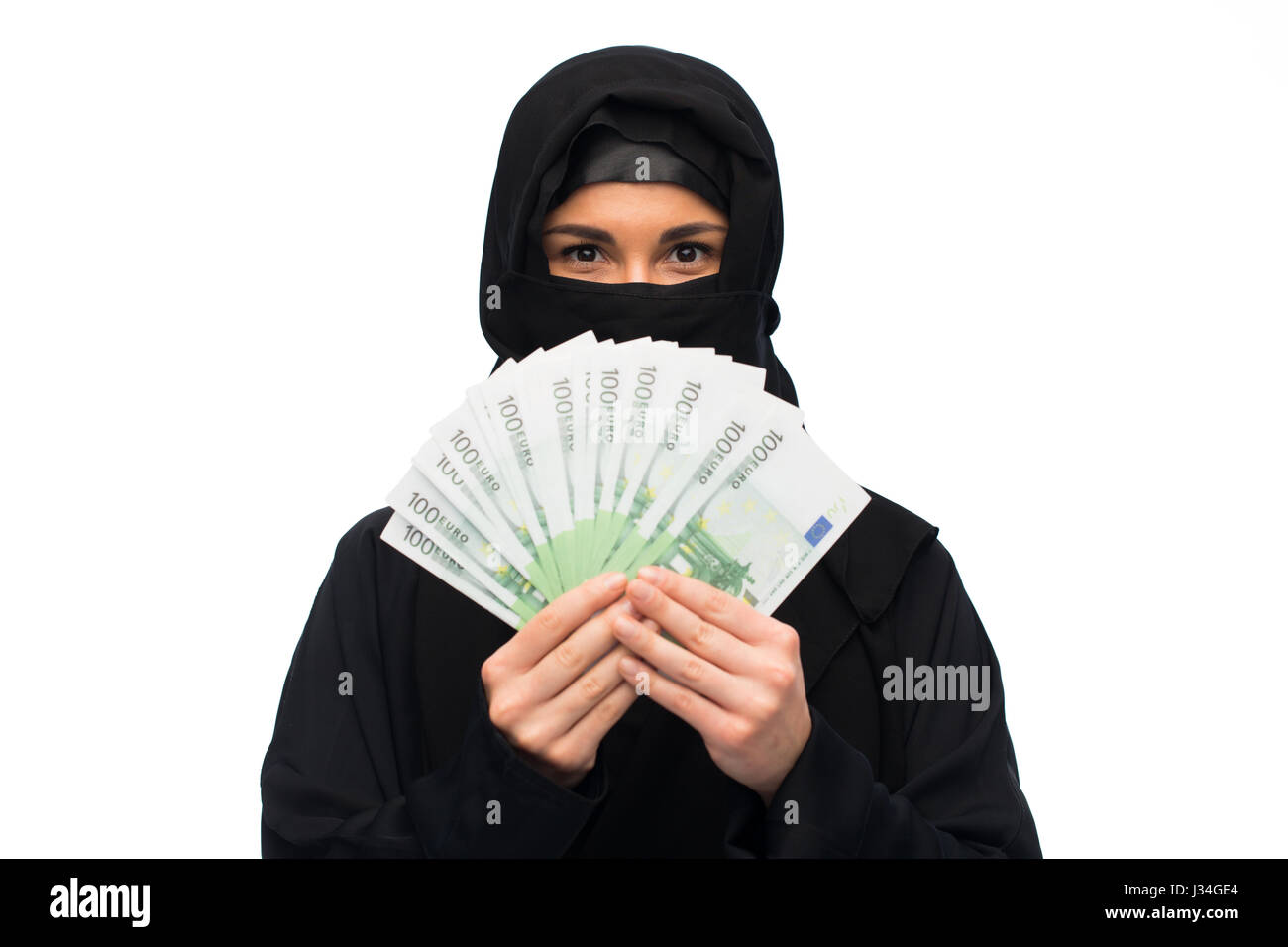 muslim woman in hijab with money over white Stock Photo - Alamy