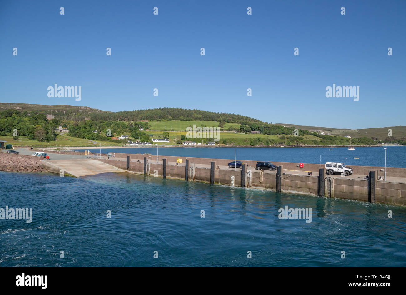 View of the pier on the Isle of Raasay in Scotland taken from the ...